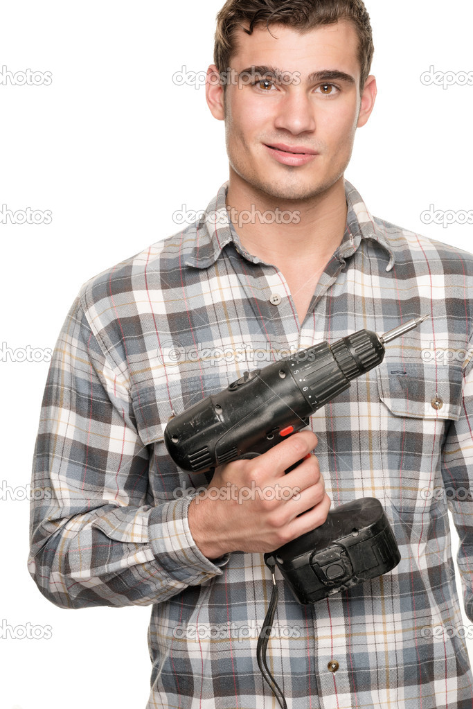 Man with drill machine Stock Photo by ©PicterArt 12228141