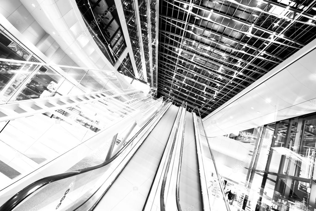 Elevator in the modern futuristic interior with concrete arches on ...