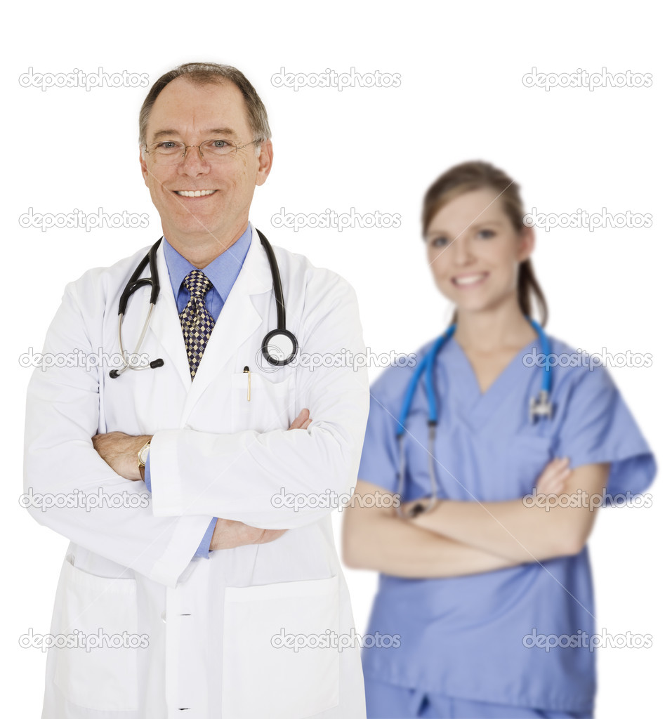 A group of confident doctors and nurses with their arms crossed ...