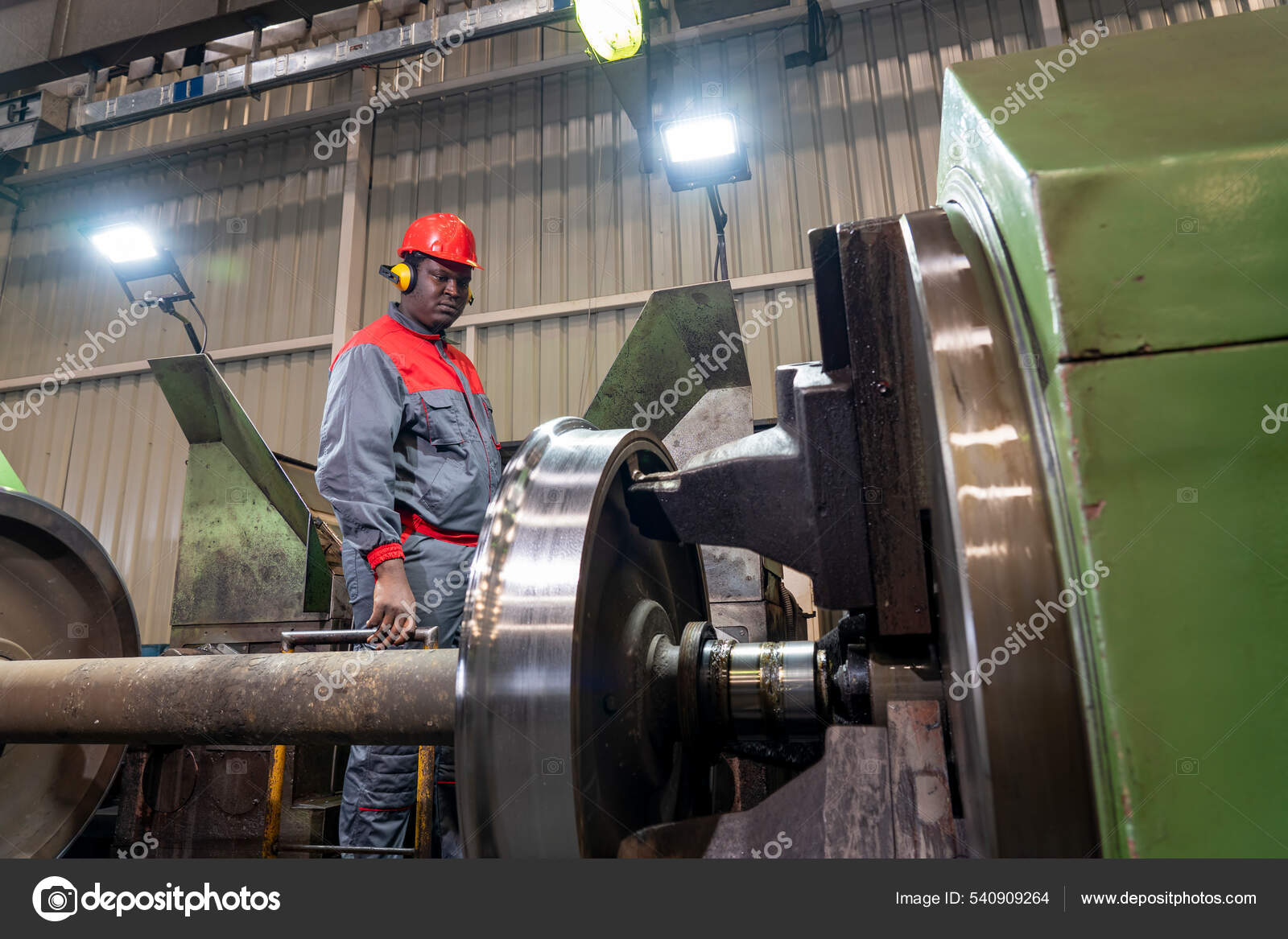 African American Cnc Machine Operator Monitoring Train Wheel ...