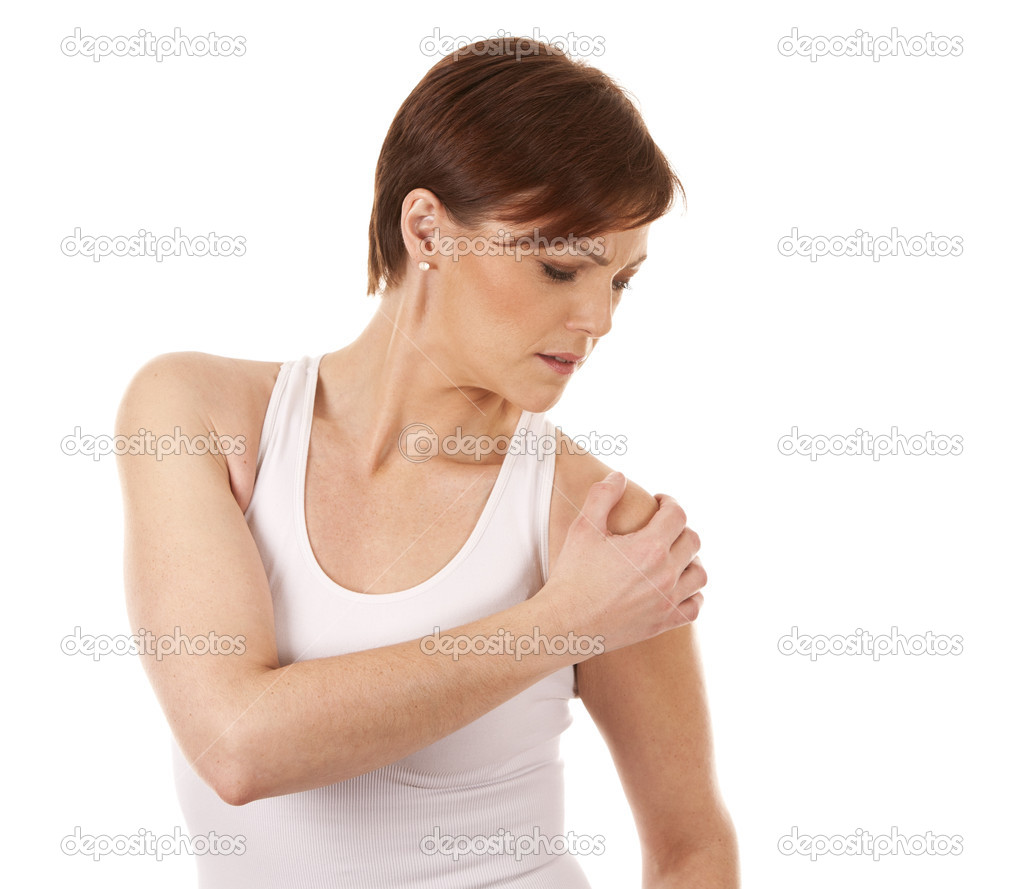 Woman having a shoulder pain Stock Photo by ©zdenkam 40370363