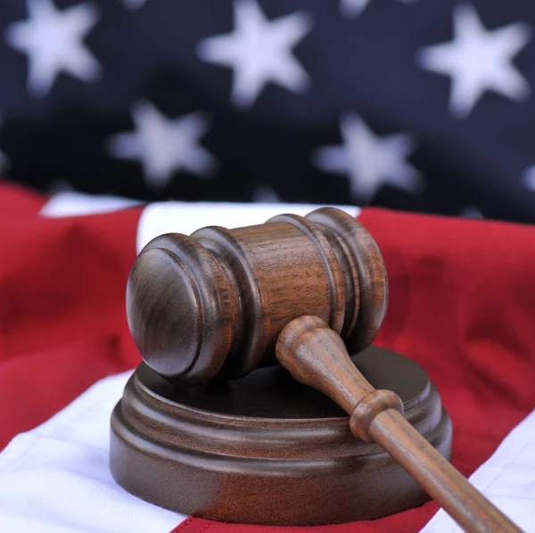 American flag and judicial symbols Stock Photo by ©alancrosthwaite 38780641