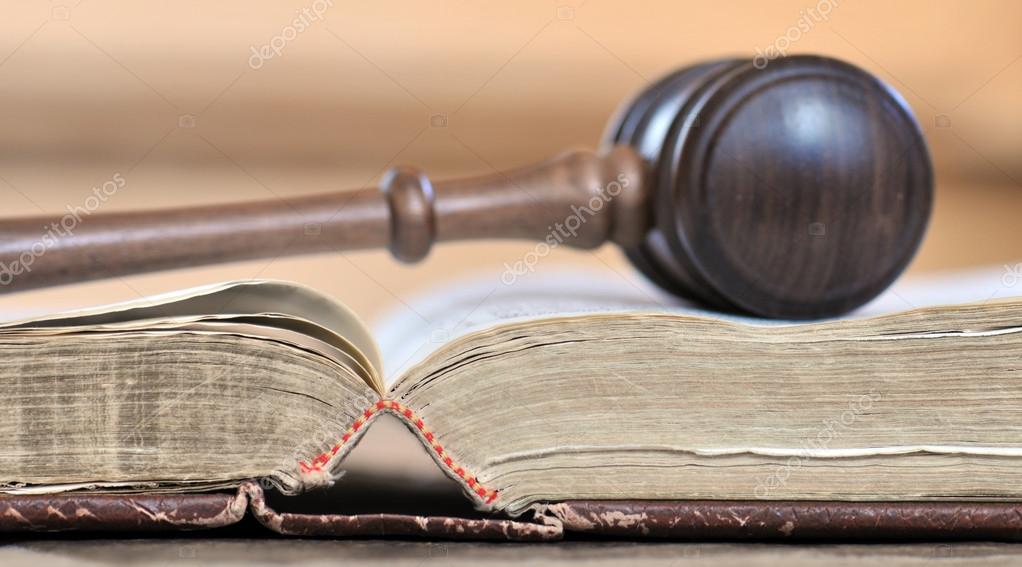 Gavel over weathered book Stock Photo by ©alancrosthwaite 38781765