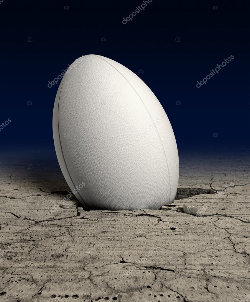 Rugby Ball Crushed Into The Dirt Stock Photo by ©albund 12630235