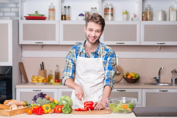 Man cooking dinner Stock Photos & Royalty-Free Images | Depositphotos