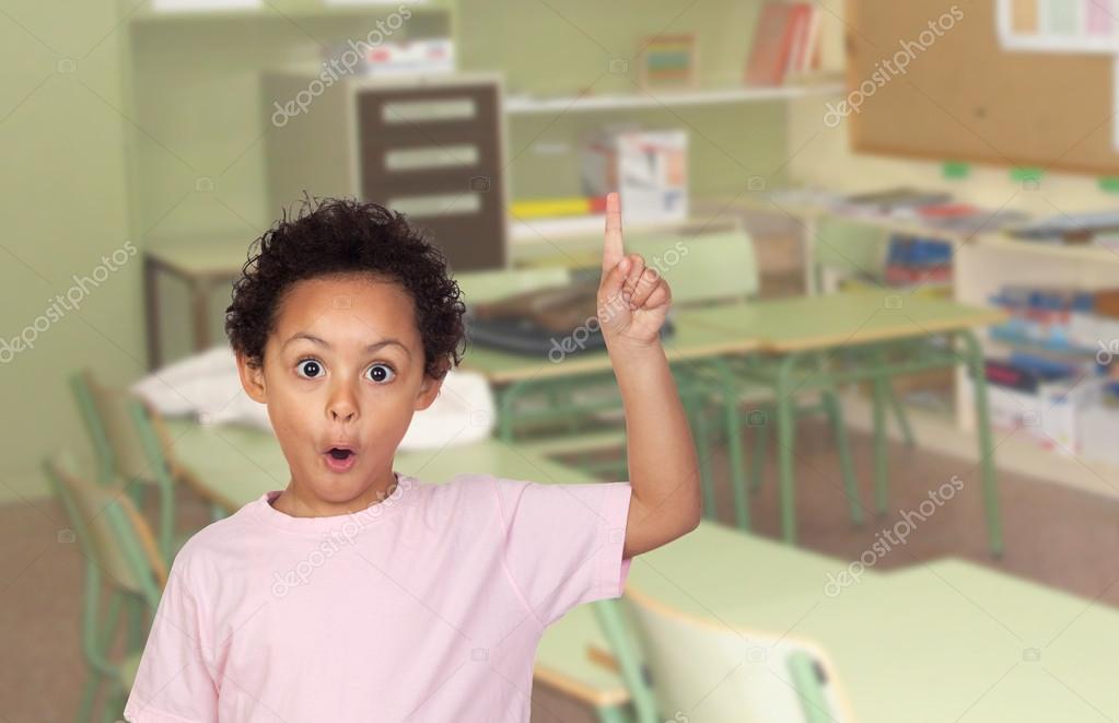 Happy latin child asking to speak — Stock Photo © Gelpi #19523725