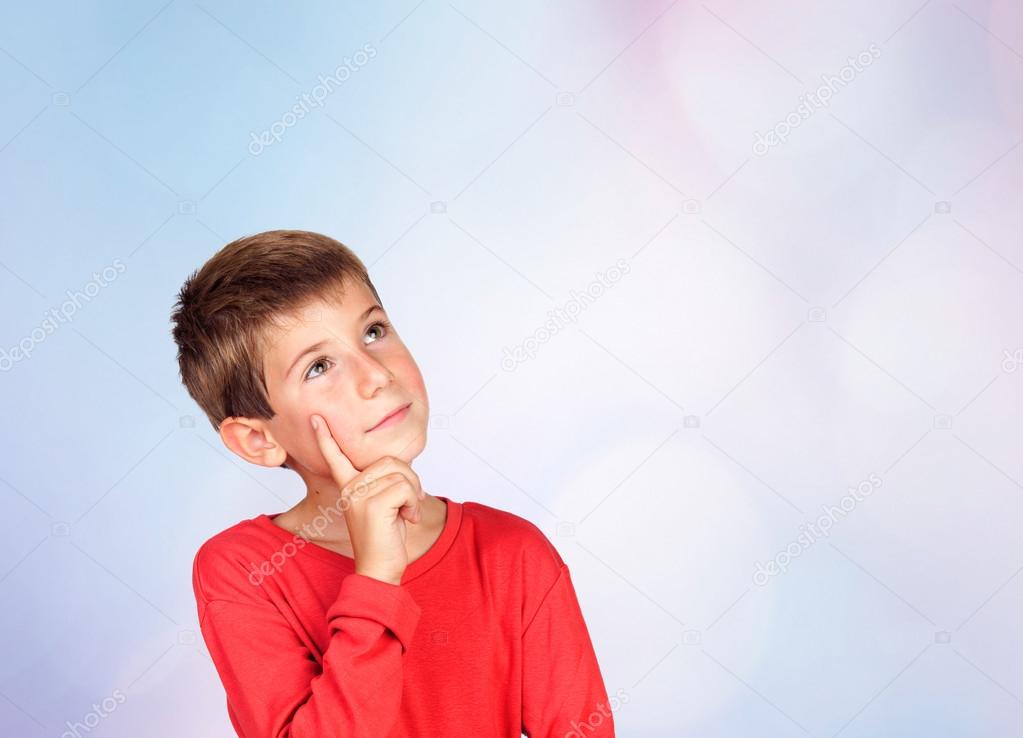 Pensive child with blond hair Stock Photo by ©Gelpi 21118053