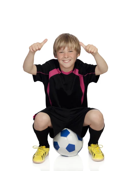Preteen with a uniform for play soccer Stock Photo by ©Gelpi 24343635