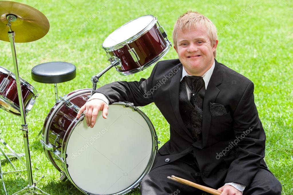 Young handicapped drummer next to drums. — Stock Photo © karelnoppe ...