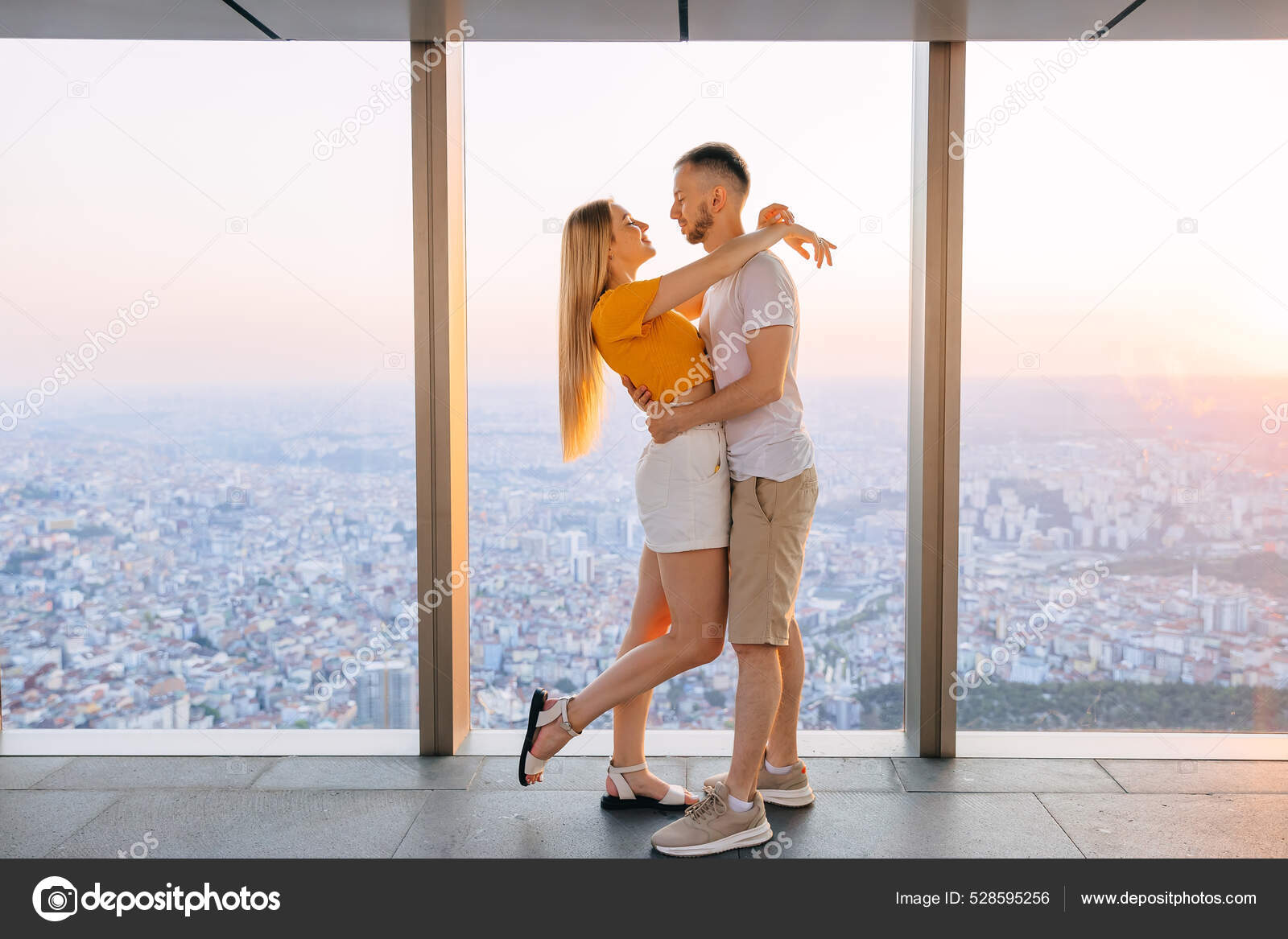 Romantic Couple Hugs Window Tall Sapphire Building Overlooking City ...