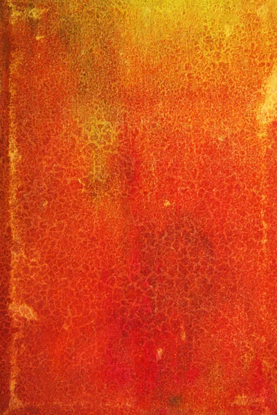 Abstract textured background: red and orange patterns on yellow leather ...