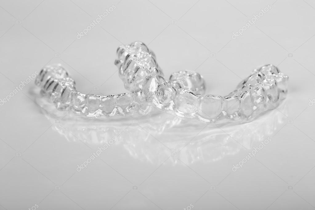 Translucent upper and lower essix retainers — Stock Photo © BartKowski ...