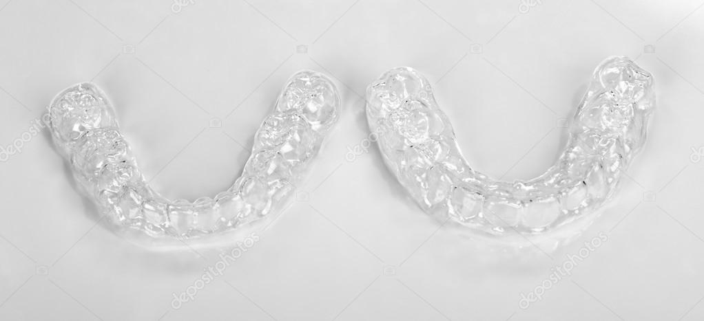 Translucent upper and lower essix retainers — Stock Photo © BartKowski ...