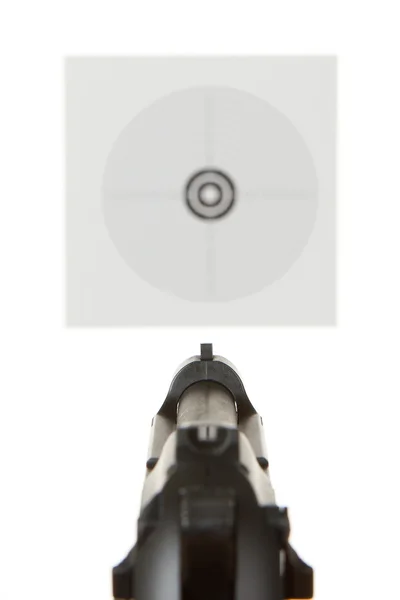 Handgun aimed on a shooting target — Stock Photo © michaklootwijk #12501569