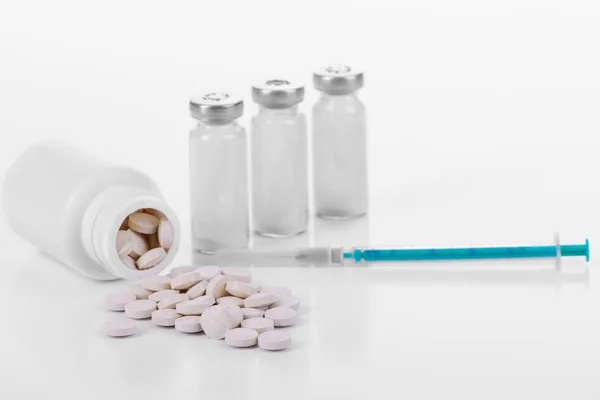 Pharmacology tablets vials syringes Stock Photo by ©Inna_Astakhova 42050323