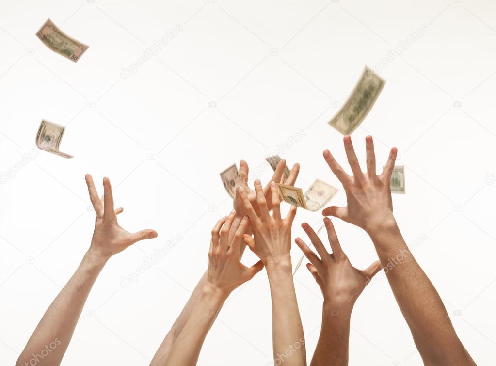 Many hands competing for money Stock Photo by ©zestmarina 19875059