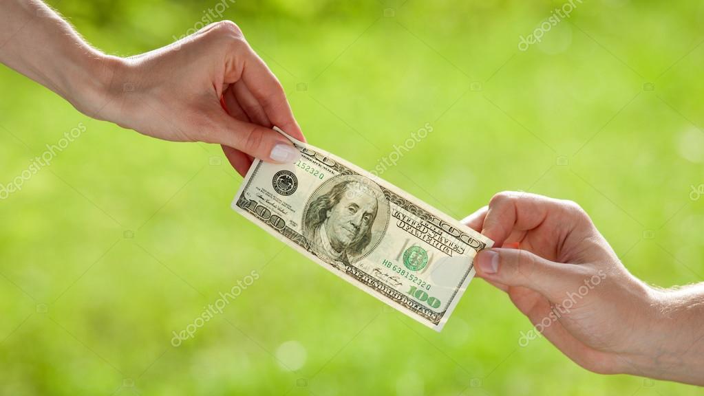 Hands pulling dollar banknote Stock Photo by ©zestmarina 31238761