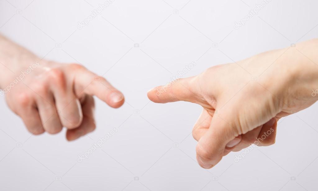 Pointing At Each Other