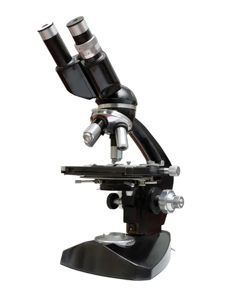 Old optical microscope Stock Photo by ©spaxiax 2549411