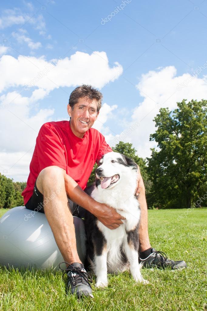Happy man and his dog — Stock Photo © amyinlondon #31232115