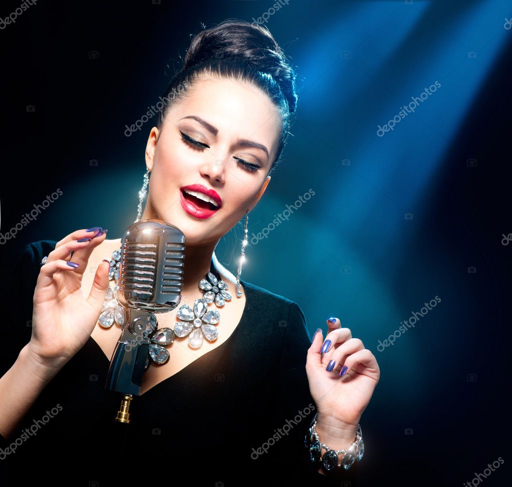 Singing Woman with Retro Microphone — Stock Photo © Subbotina #24593603