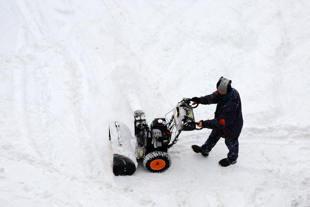Man pushing snow blower Stock Photo by ©profoto8213 19166119