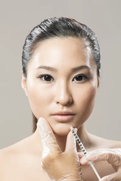 Woman with different shades of foundation — Stock Photo © kazzakova ...