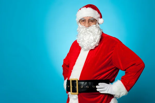 Aged Santa dangling a key Stock Photo by ©stockyimages 15657827