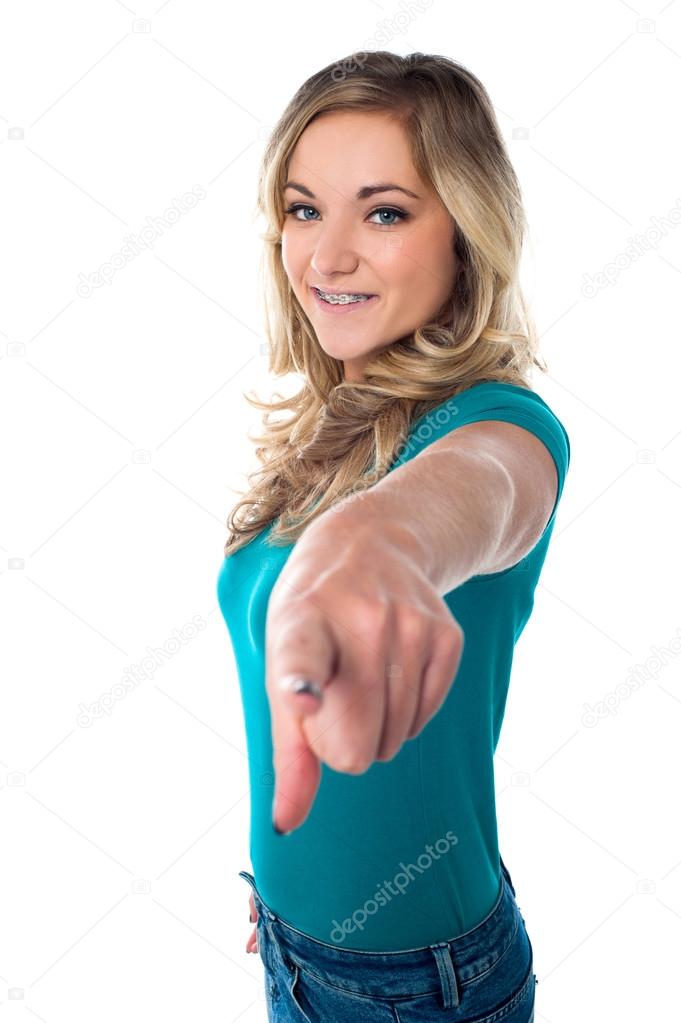 Cute young girl pointing you out Stock Photo by ©stockyimages 24626027
