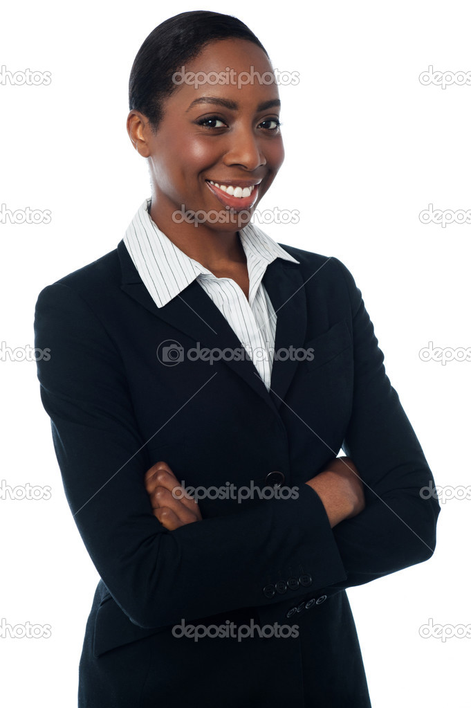 Confident female executive posing Stock Photo by ©stockyimages 32568735