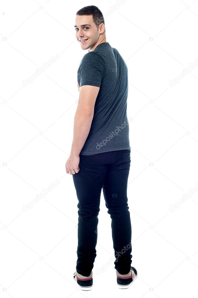 Handsome young guy looking back Stock Photo by ©stockyimages 39222853