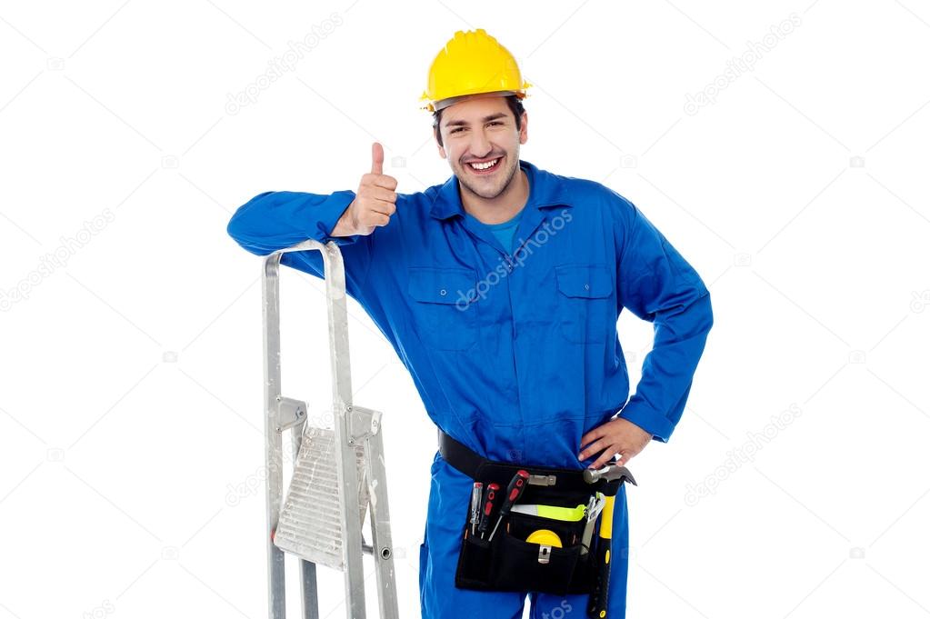 Construction worker posing with step ladder — Stock Photo ...