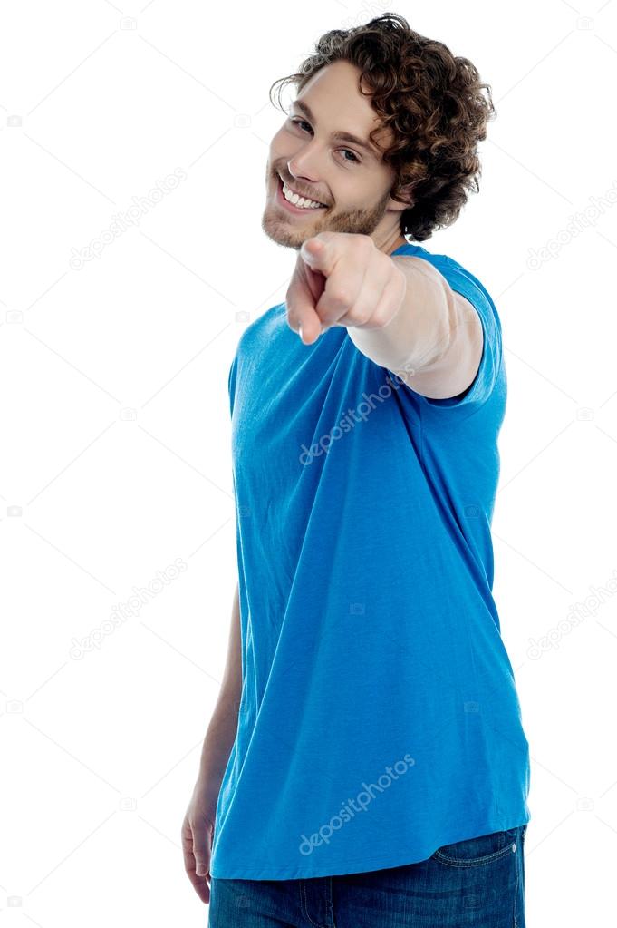 Young man pointing towards camera Stock Photo by ©stockyimages 48589095 Young man pointing towards camera Stock Photo by ©stockyimages 48589095