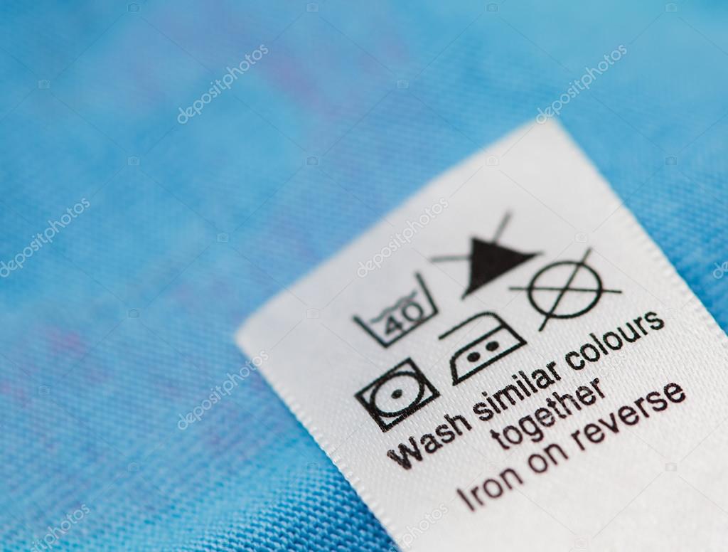 Clothing label with laundry care instructions Stock Photo by ©ollzha ...