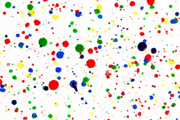 Colorful ink splashes. Paint splatters on bright material. Multi color ...