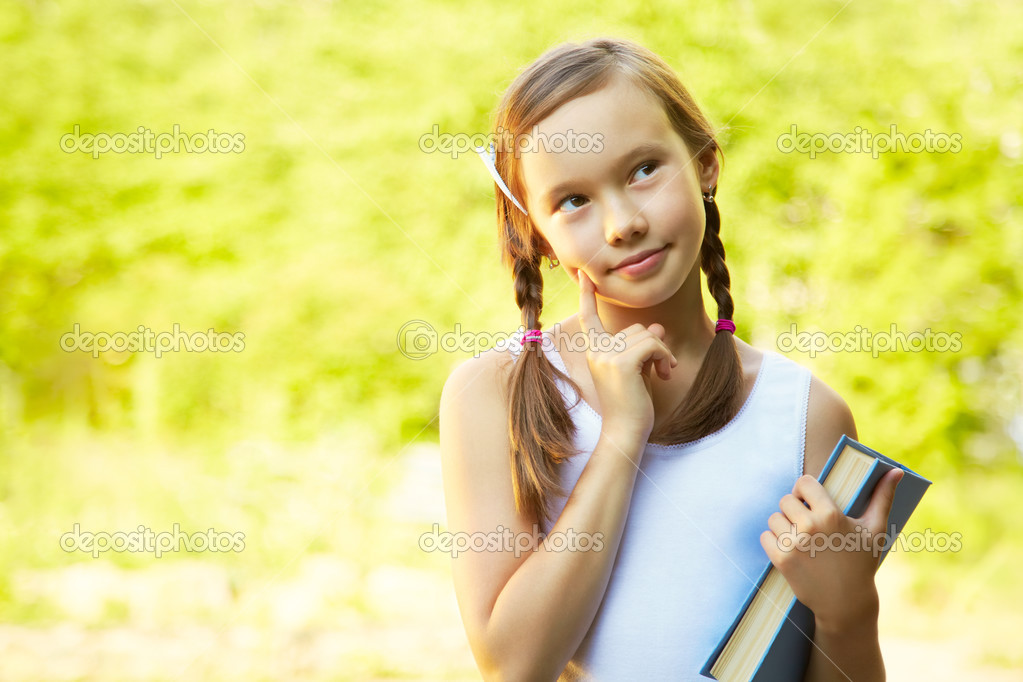 Girl with a book Stock Photo by ©bakharev 29241733