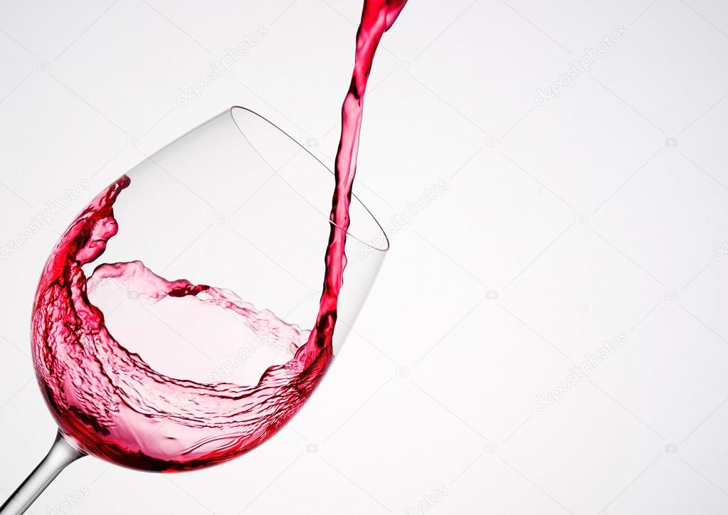 Wine pouring into a glass in diagonal composition Stock Photo by ...