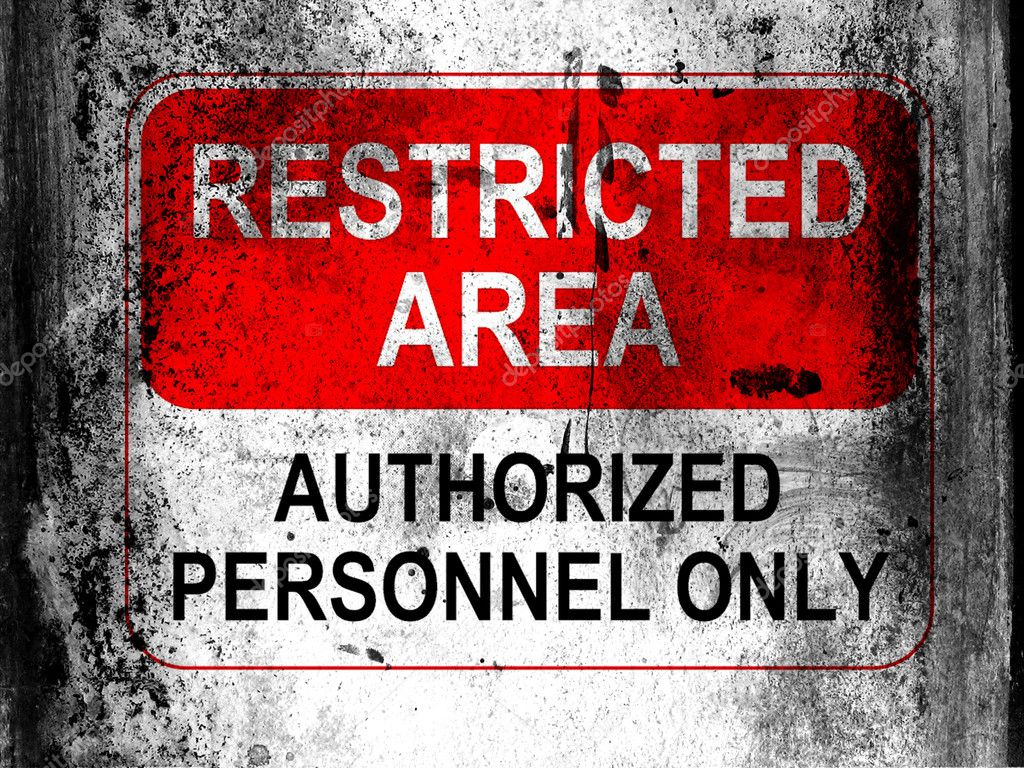 Restricted area sign painted on board with grungy dirty stains all over ...