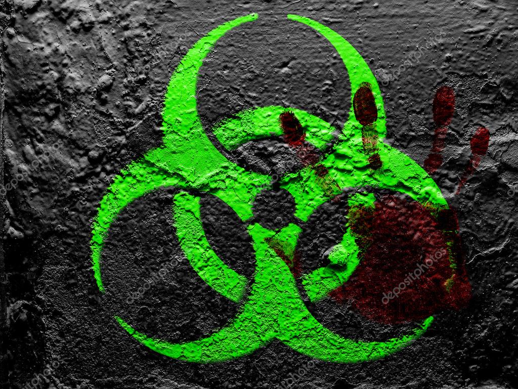 Biohazard sign painted on grunge wall with bloody palmprint over it ...