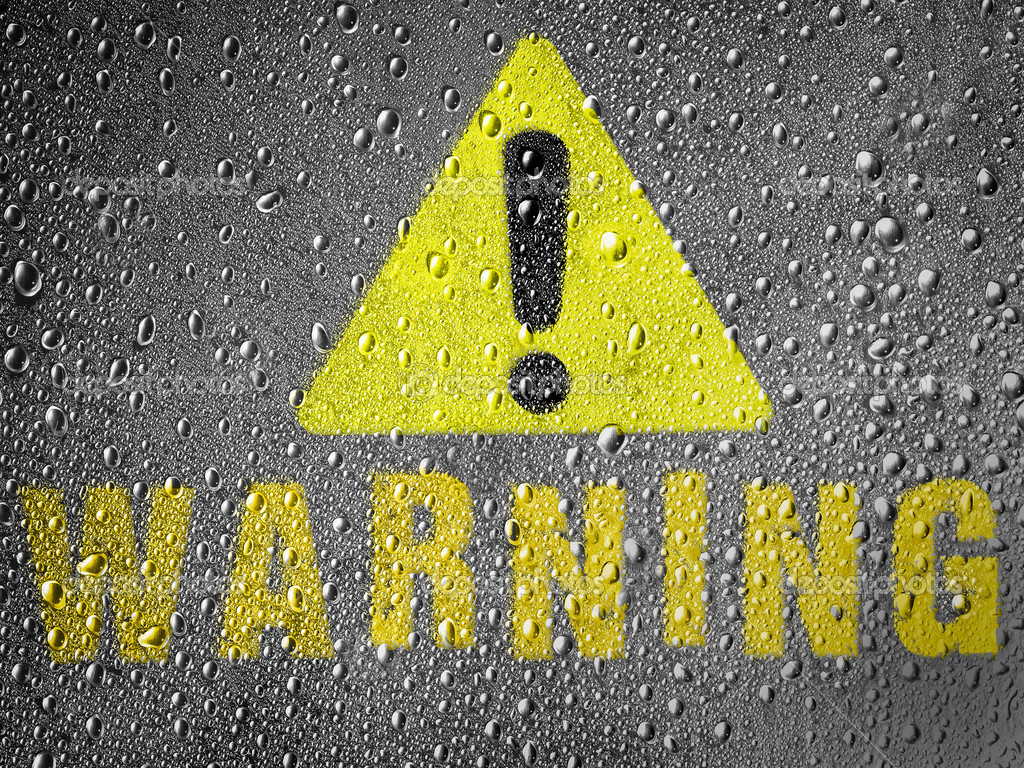 Warning sign painted on metal surface covered with rain drops — Stock ...
