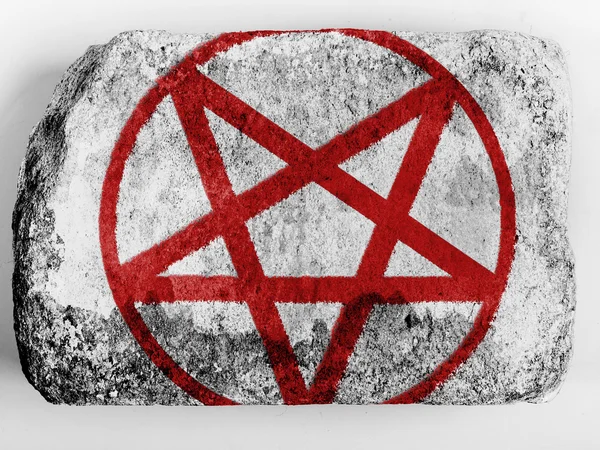 Pentagram symbol painted on metal surface covered with rain drops ...