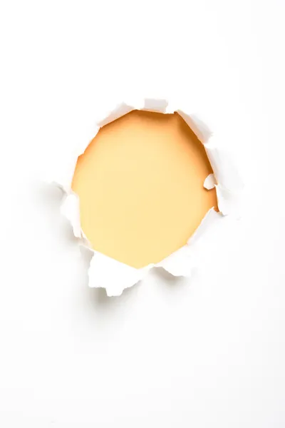 Hole in paper sheet Stock Photo by ©Rangizzz 9591700