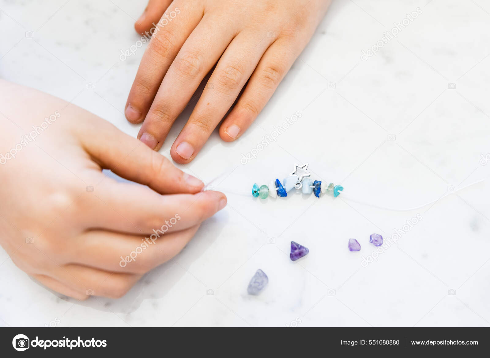 Child Hands Threading Stone Beads Bracelet Charm Stock Photo by ©Cavan ...
