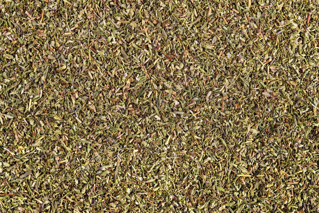 Especia de tomillo seco para el fondo de los alimentos. 2024