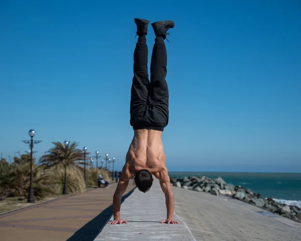 Man handstand Stock Photos, Royalty Free Man handstand Images ...