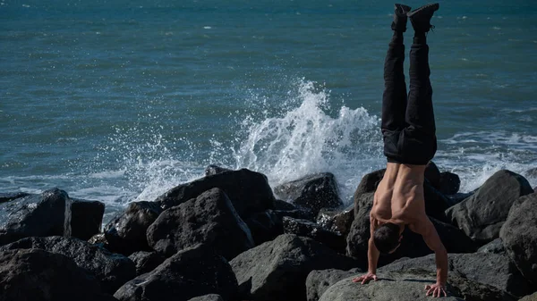 Shirtless Caucasian Man Doing Backflip Pebble Beach — Stock Photo ...