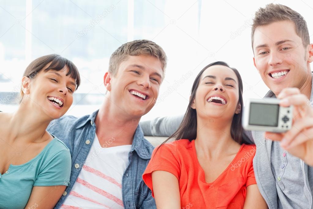A laughing group pose for a funny photo Stock Photo by ©Wavebreakmedia ...