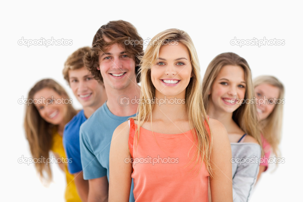 Group standing behind one another at varied angles Stock Photo by ...