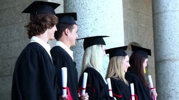 Flying graduation caps with confetti. Academic hats in air with golden ...