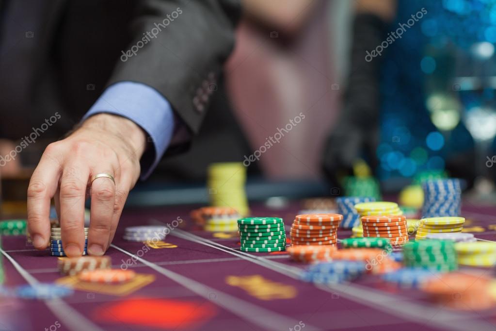 Man placing a bet — Stock Photo © Wavebreakmedia #23092622